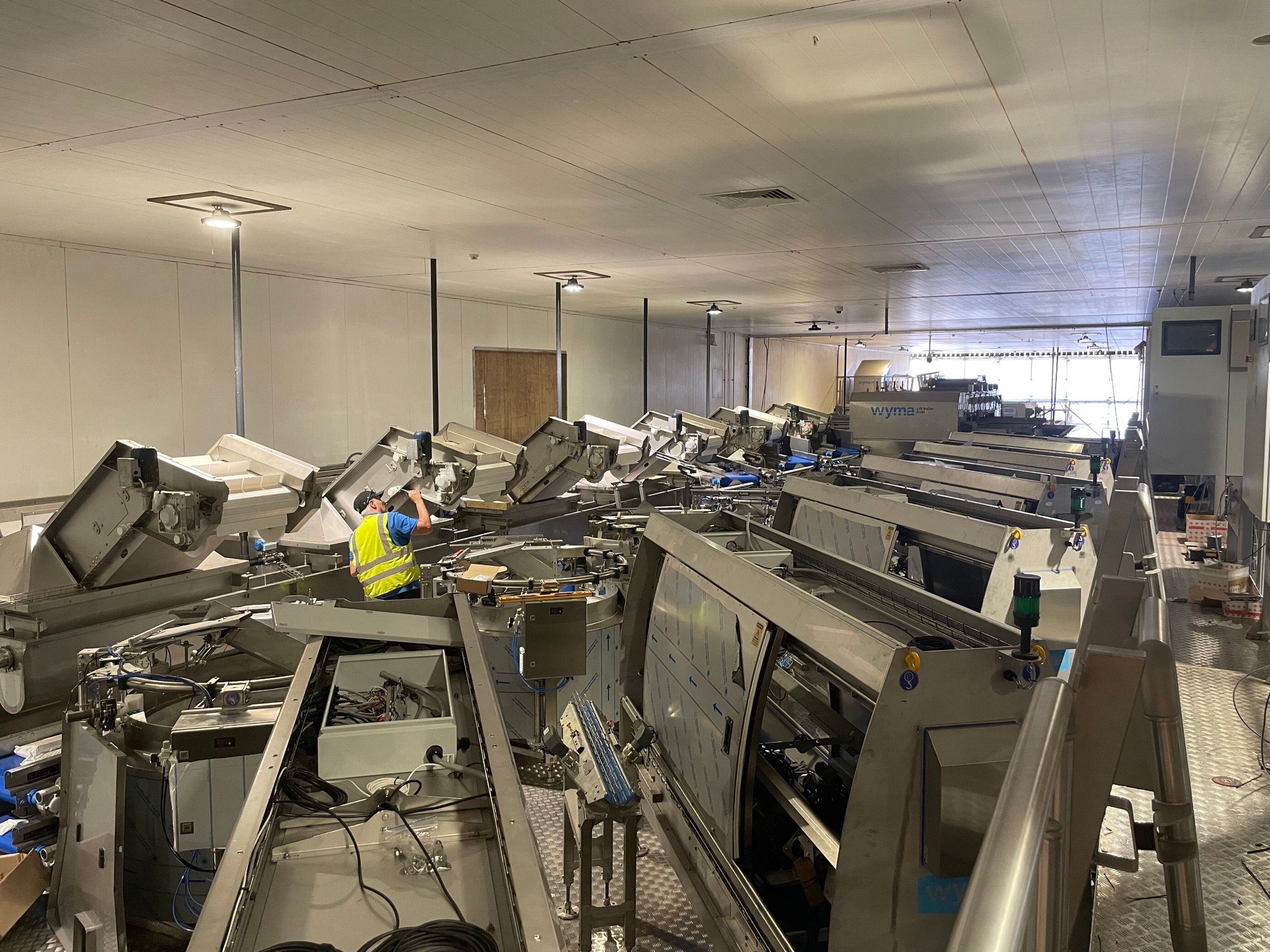 Innovative vegetable trimmer installation nearing completion